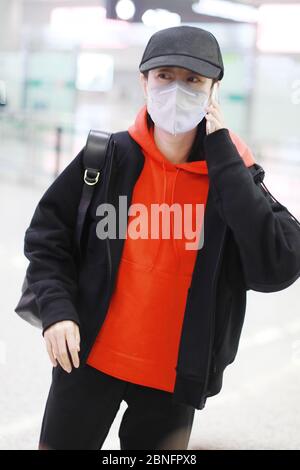 Chinese actress Liu Mintao shows up at a Shanghai airport after landing ...