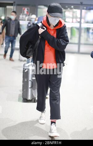 Chinese actress Liu Mintao shows up at a Shanghai airport after landing ...