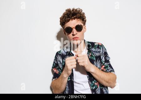 Sassy good-looking caucasian curly-haired girl hinting awesome party ...