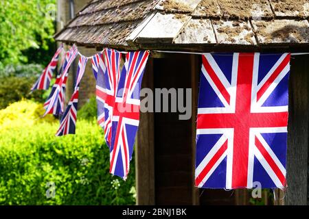 Union Jack bunting in celebration of the 75th anniversary of VE day at ...