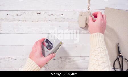 Flat lay. Step by step. Cutting out snowflakes with cookie cutters out ...