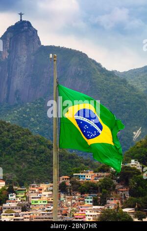 flag of brazil with image of christ the redeemer in the background in ...
