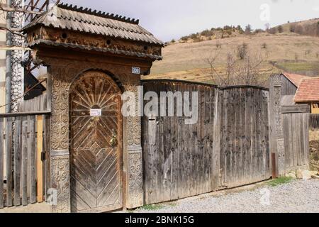 Traditional wooden Székely ( Szekely ) gates in a Szekely village near ...