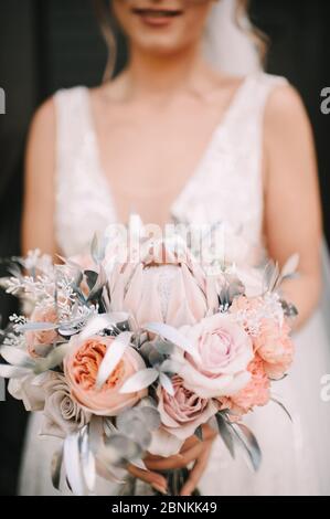 Rose and protea flowers in wedding bouquet. Party decor Stock Photo - Alamy