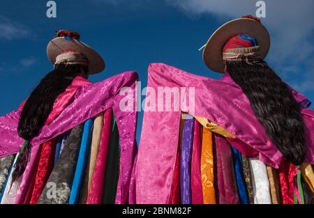 Indigenous Salasaca Indians in traditional masks and headdresses ...