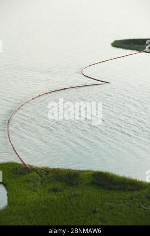 Aerial view of oil containment booms protecting Queen Bess Island ...