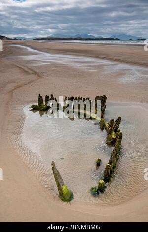 Wreck of the Brig Athena exposed at low tide on Malltraeth beach ...