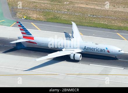 Wing of a plane with the flaps and slats deployed to reduce the speed ...