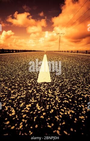 Median strip on an asphalt road Stock Photo - Alamy