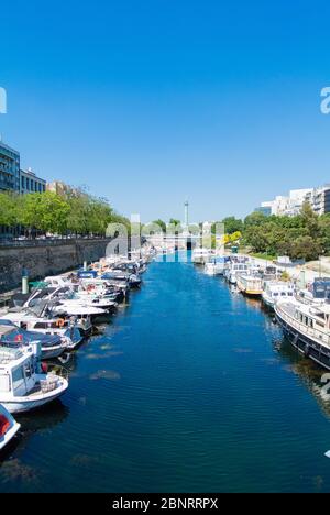 Paris, Bastille, beautiful harbor with houseboats, and typical facade ...