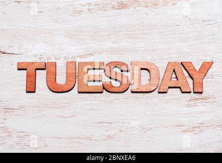 Tuesday, word in wooden alphabet letters isolated on background Stock ...
