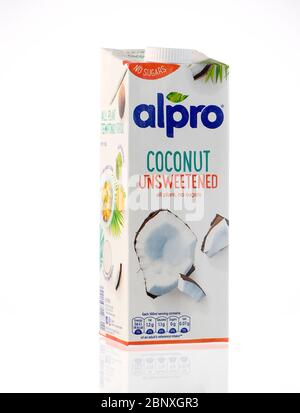 A carton of Alpro No Sugars Coconut drink is displayed on a white ...