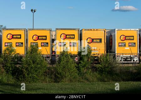 Truck trailers with logos outside of a facility occupied by Estes ...
