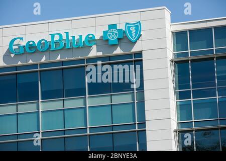 A logo sign outside of the headquarters of GeoBlue in King of Prussia ...