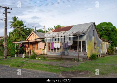 A traditional Fijian house in a village in Fiji in the South Pacific ...