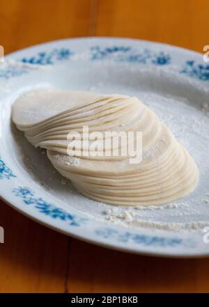 Stack of dumpling skin closeup Stock Photo - Alamy