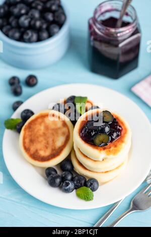 Delicious dessert. Cottage cheese with jam, yogurt, fresh strawberries ...