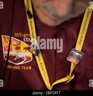 On November 26, 2018, members of the Mars InSight team celebrate the ...