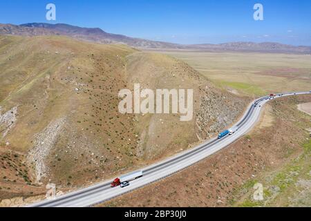 Aerial view above I-5 highway at the Grapevine, in Kern County ...