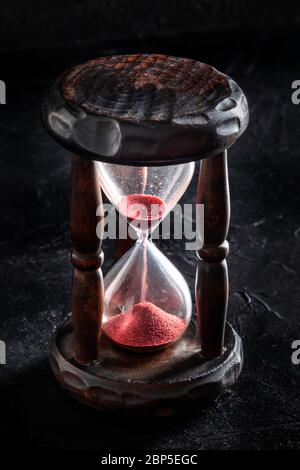 Hour glass sand timer running out of time Stock Photo - Alamy
