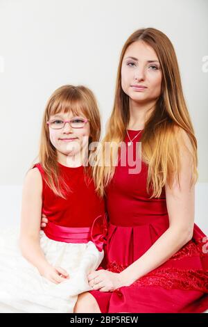 Family relationships. Beauty mother with lovely daughter spending time ...