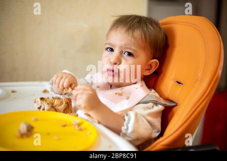 Happy child grimacing at camera. Happy childhood. Salvador, Brazil ...