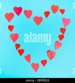 Big heart of small hearts with a sheet of paper inside mock-up on a ...