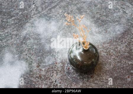 Mini vase on marble table, stock photo Stock Photo - Alamy