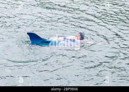 In folklore, a mermaid is an aquatic creature with the head and upper ...