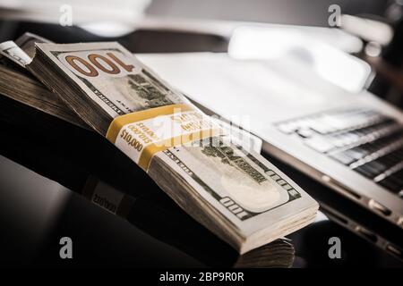 A bundle of two thousand dollars in bills of one hundred American ...