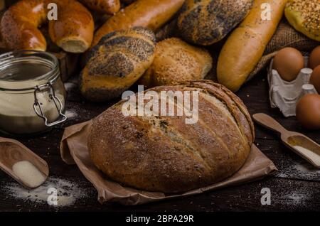 Homemade bread, product photo, selective focus, others pastries behind ...