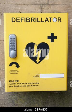 NHS defibrillator on wall in public area heart sign symbol "heart ...