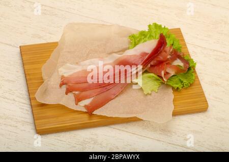 Spanish Hamon meat served salad leaves Stock Photo - Alamy