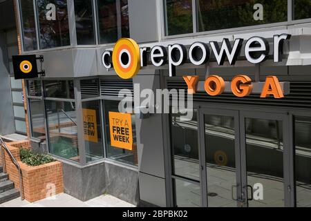 A logo sign outside of a CorePower Yoga location in Washington, D.C ...