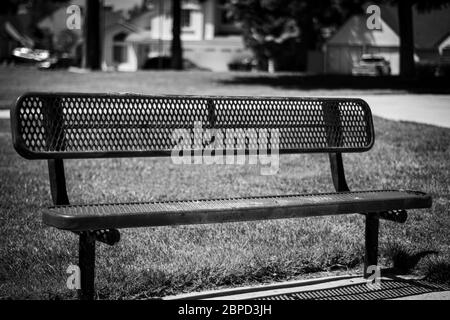 empty bench in amusement park on a sunny day Stock Photo - Alamy