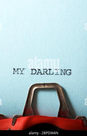 My darling text written on a paper Stock Photo - Alamy