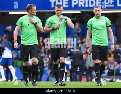 assistant referee Stuart Burt and referee Michael Oliver assistant ...