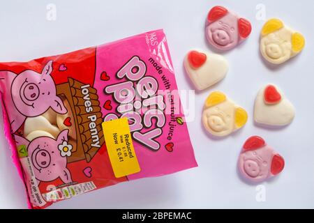 packet of percy pig loves Penny sweets made with real fruit juice isolated on white background ...