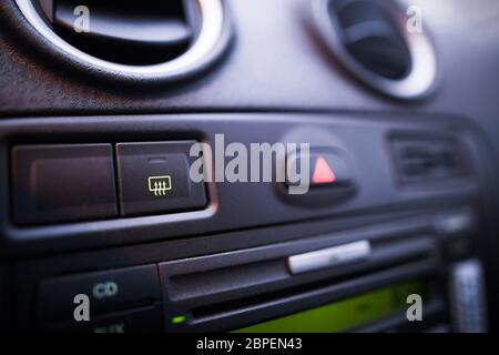 Defrost button detail on a car's dashboard Stock Photo - Alamy