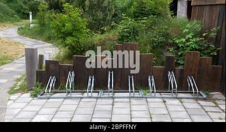 Empty bike rack in front of a building Stock Photo - Alamy