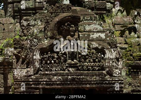 Bas-relief figure on Ta Som stone pediment Stock Photo - Alamy