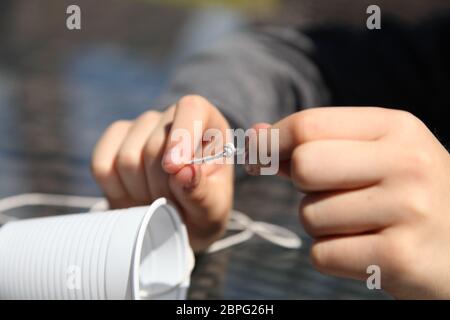 Making a telephone from plastic cups and string, science experiment ...