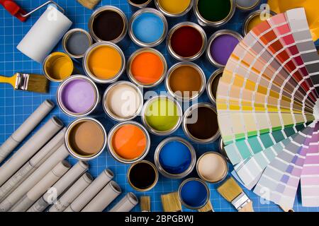 Buckets full of rainbow colored oil paint Stock Photo - Alamy