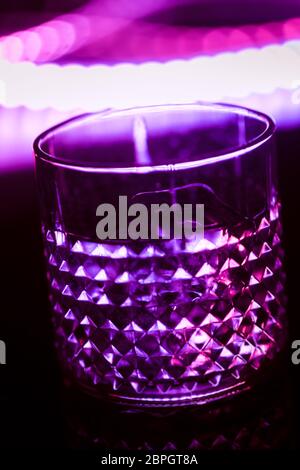 bar colored lights with glasses of alcohol Stock Photo - Alamy