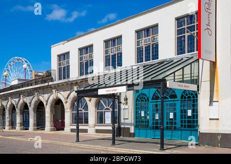 Harry Ramsden building on the front at Blackpool, Tower behind, in 1995 ...