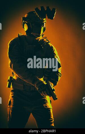 Counter terrorist squad fighter soldier aiming pistol Stock Photo - Alamy