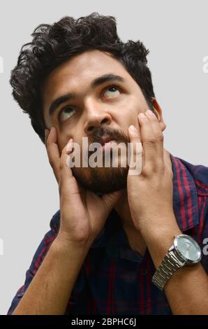 Young male businessman employee unhappy with excessive work Stock Photo ...