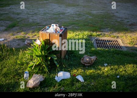 Overloaded dumpster, full garbage container, household garbage bin ...