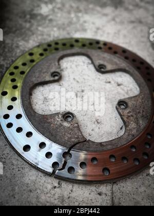 closeup old motorcycle disc break on white background Stock Photo - Alamy