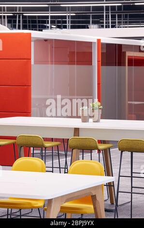 Contemporary UK office interior with primary colour furniture. UK ...